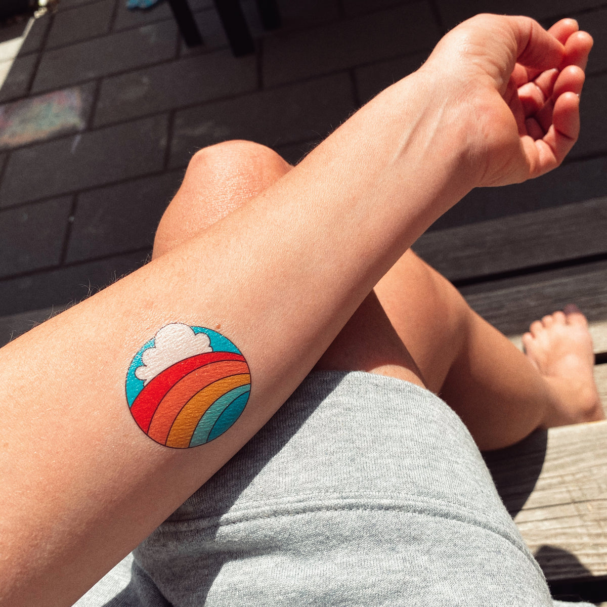 Un arc-en-ciel. – Les Tatoués